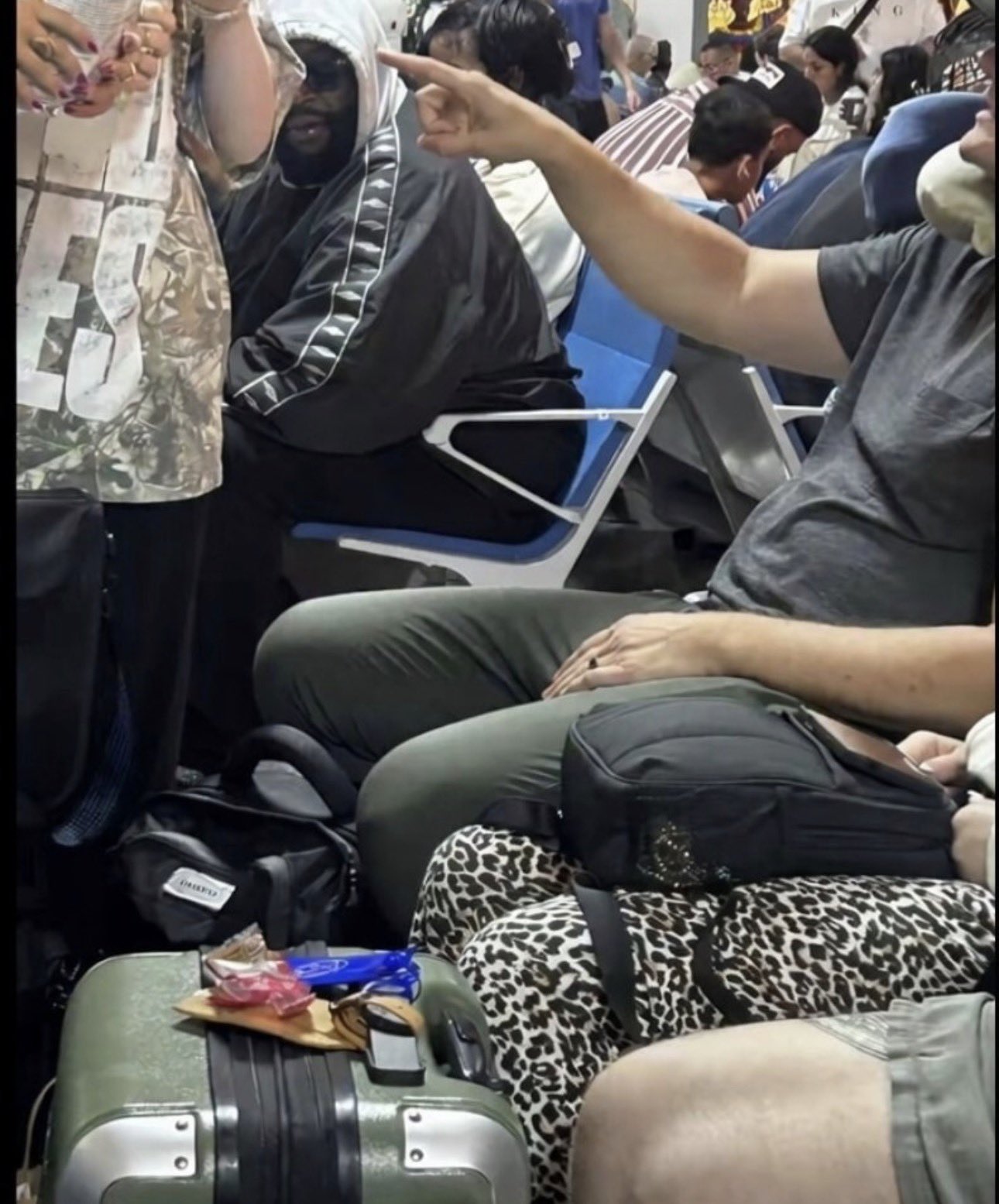 Rick Ross Spotted Flying Commercial And The Internet Has Thoughts | RGM